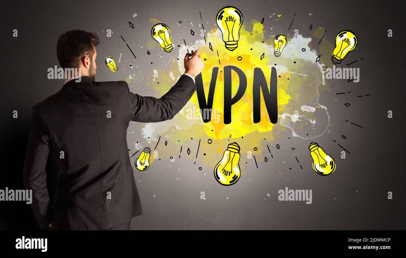 man drawing colorful light bulb Stock Photo - Alamy