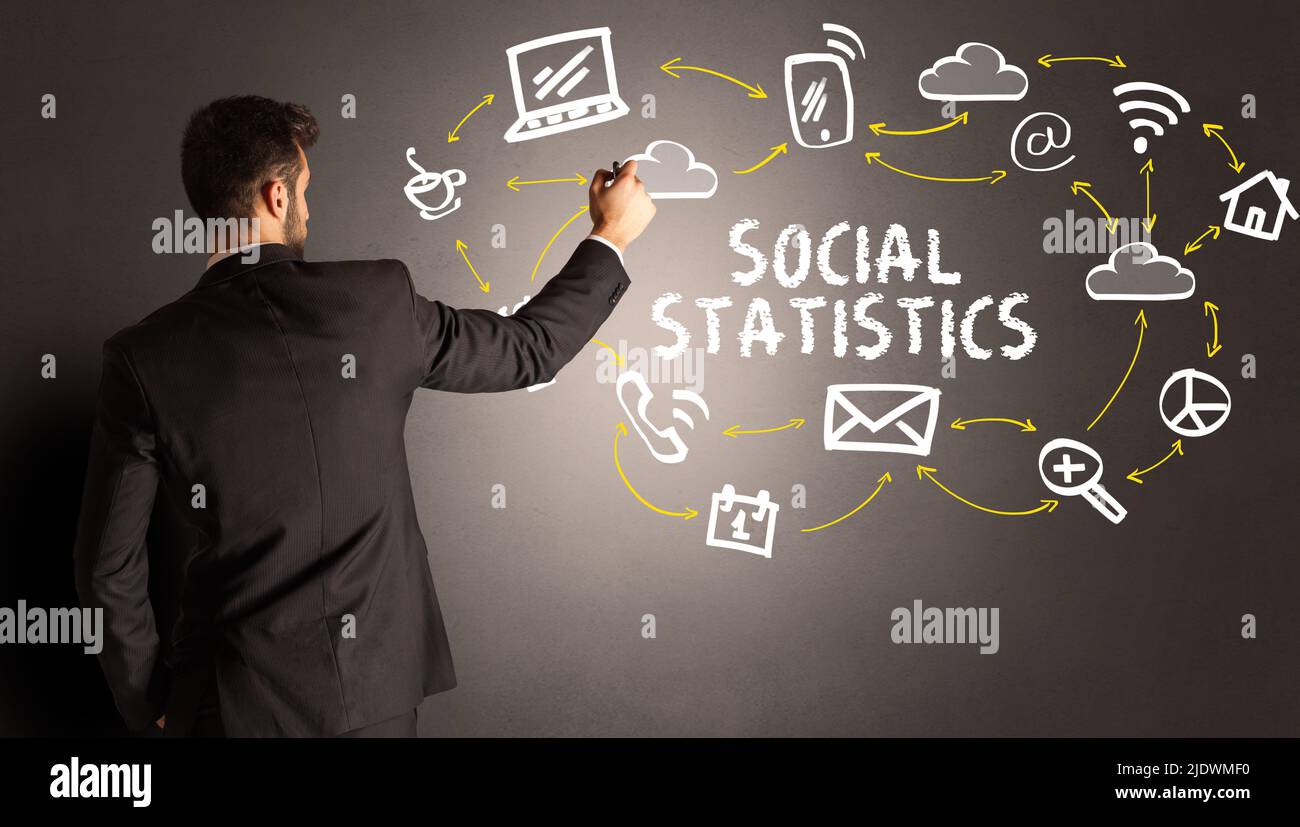 businessman drawing social media icons Stock Photo - Alamy