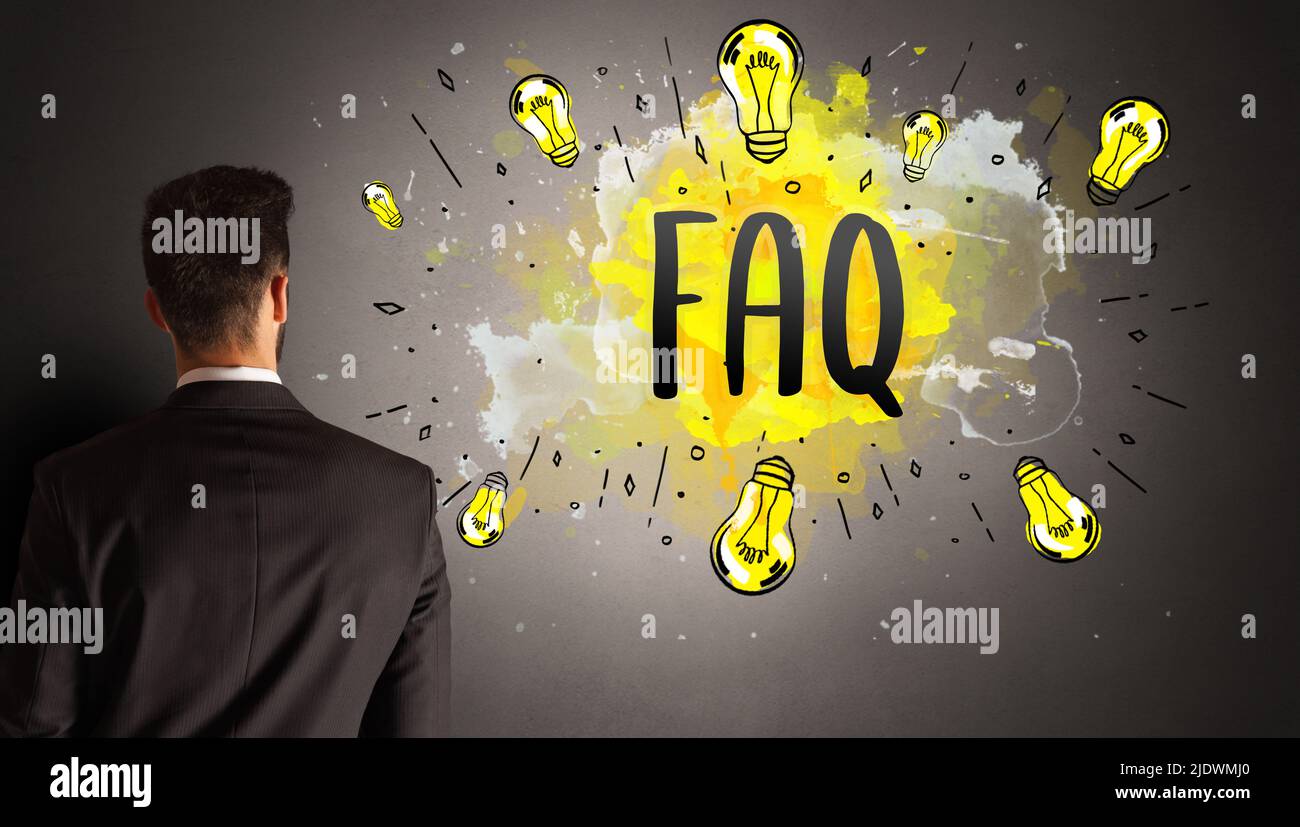 man drawing colorful light bulb Stock Photo - Alamy