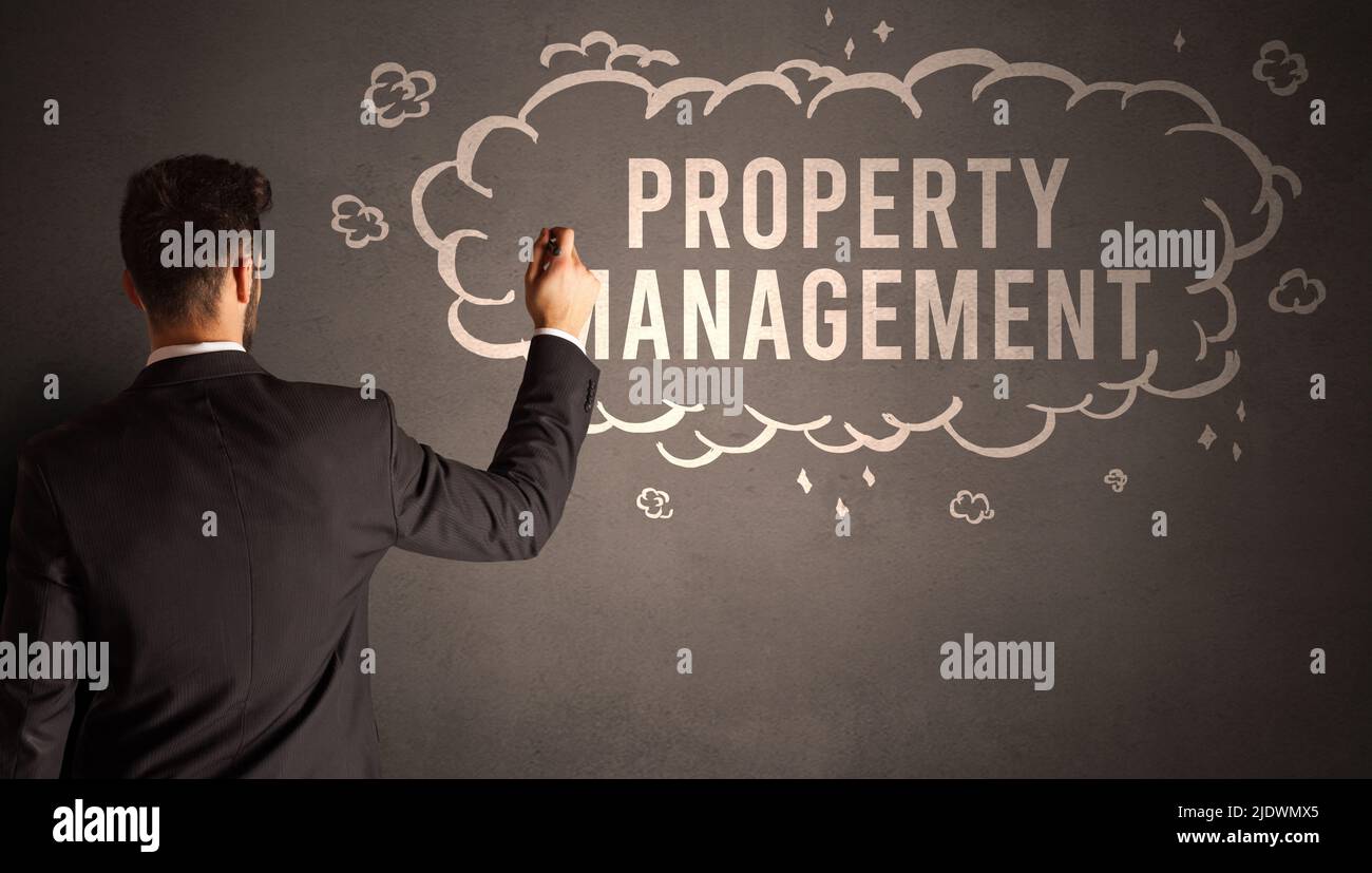 businessman drawing a cloud with inscription Stock Photo - Alamy