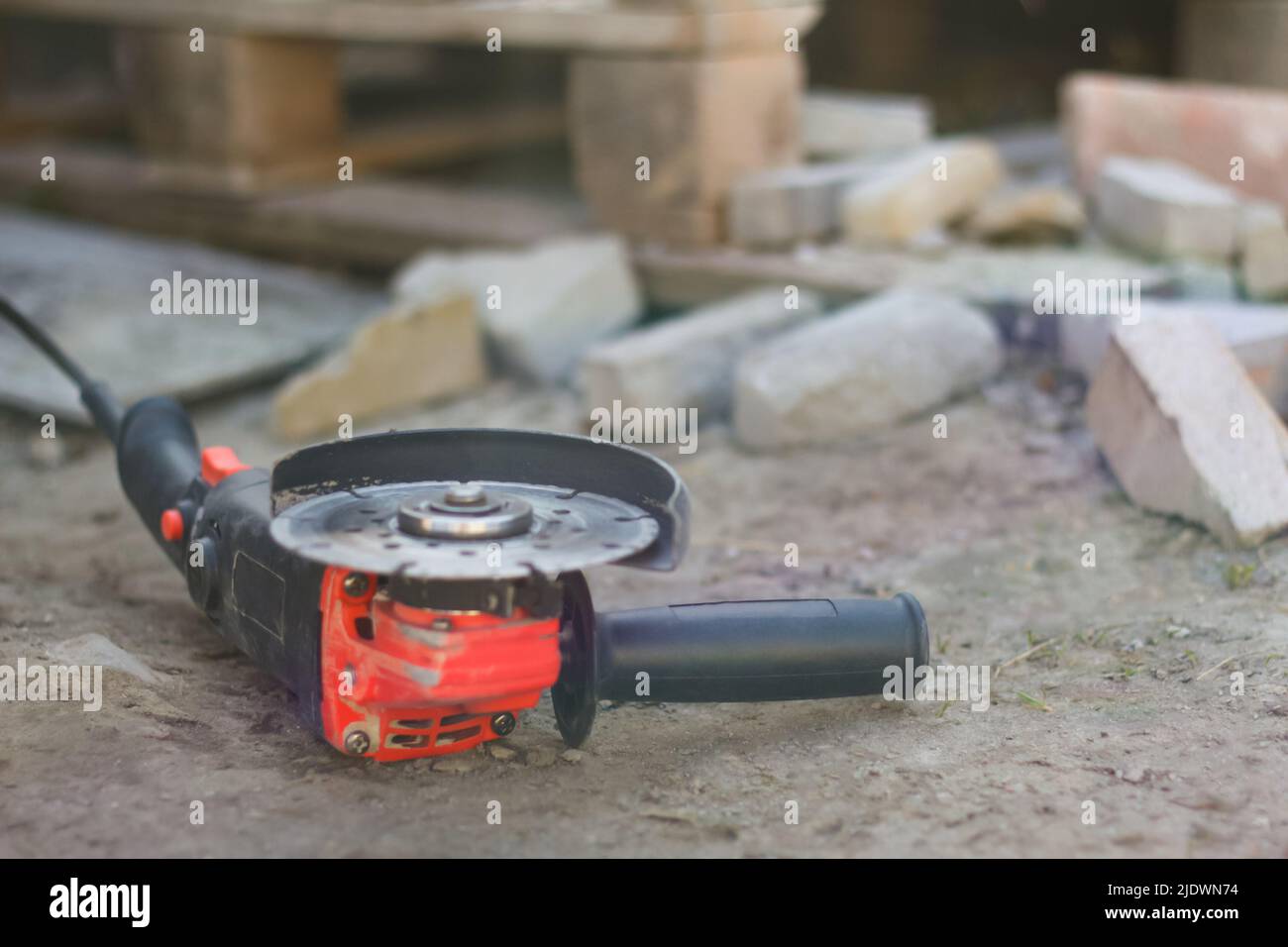 Defocus angle grinder. Tool for construction industry. Copy space ...