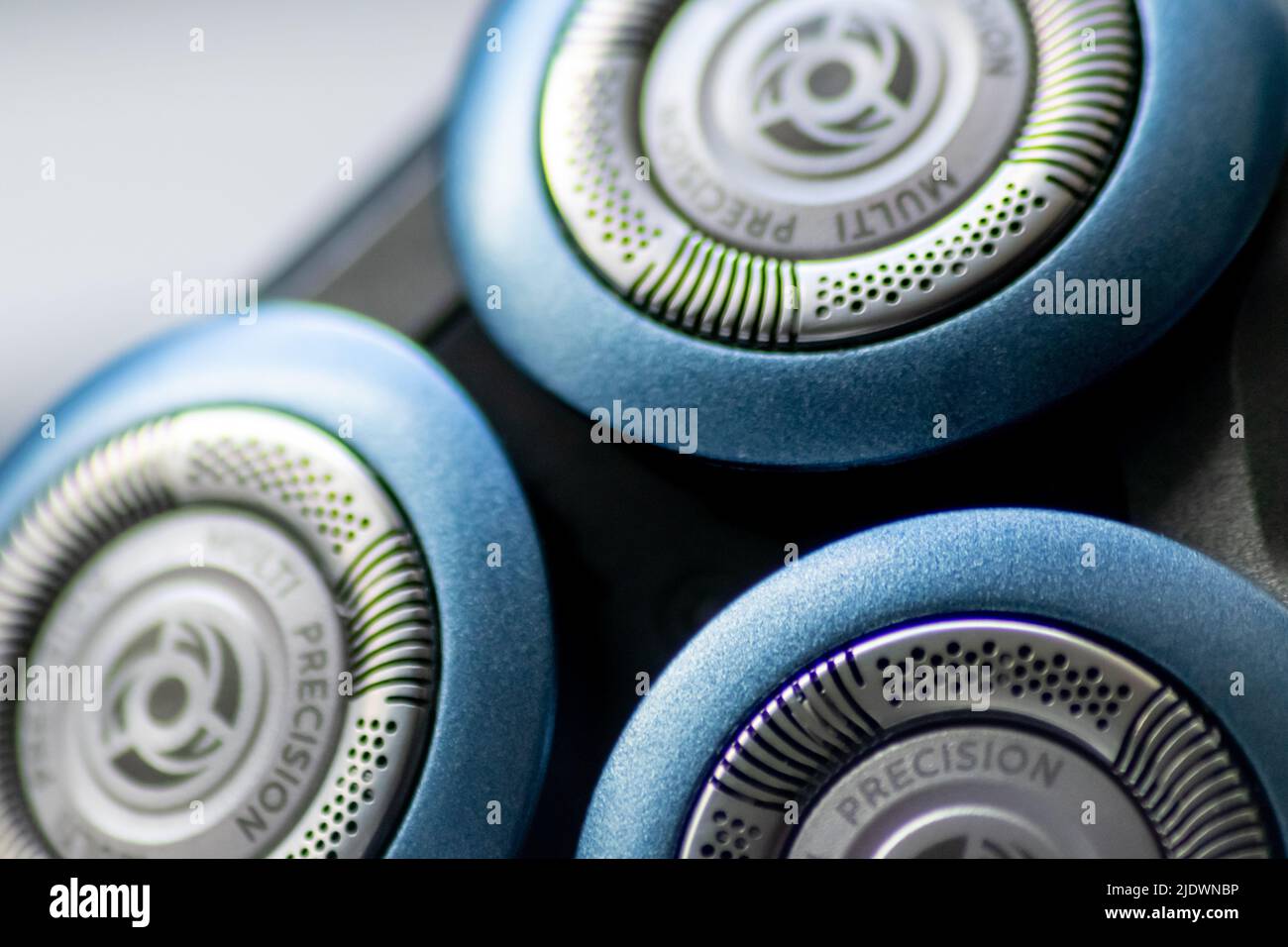 Macro close-up of electrical shaver blades triple technology for ...