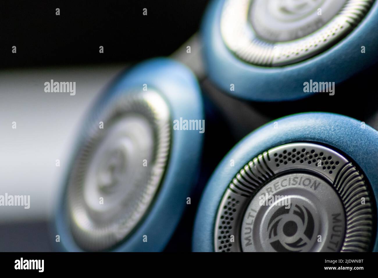 Macro close-up of electrical shaver blades triple technology for ...