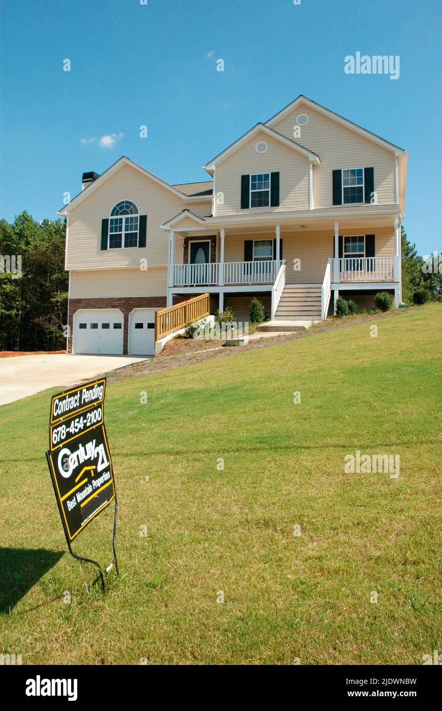 New house with tyvek and before siding is added on stripped lot without ...