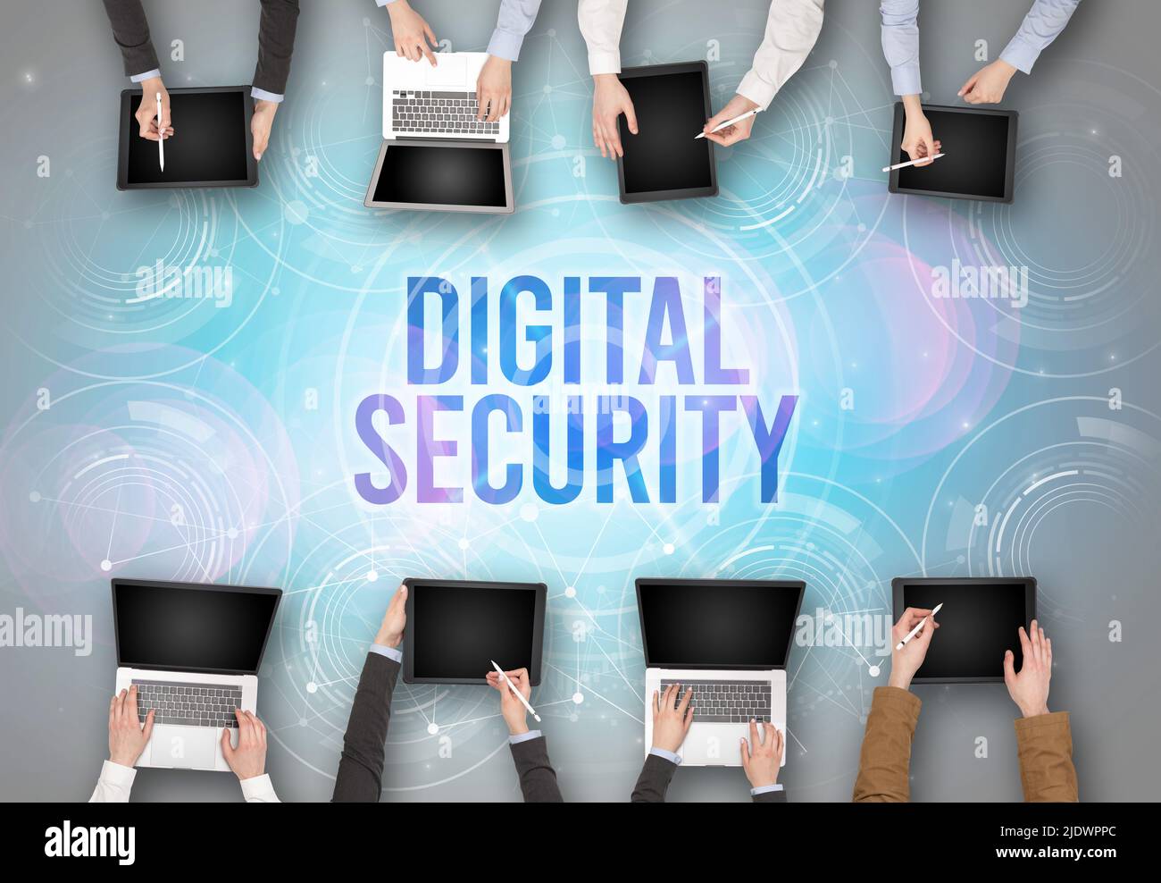 Group of people in front of a laptop, security concept Stock Photo - Alamy