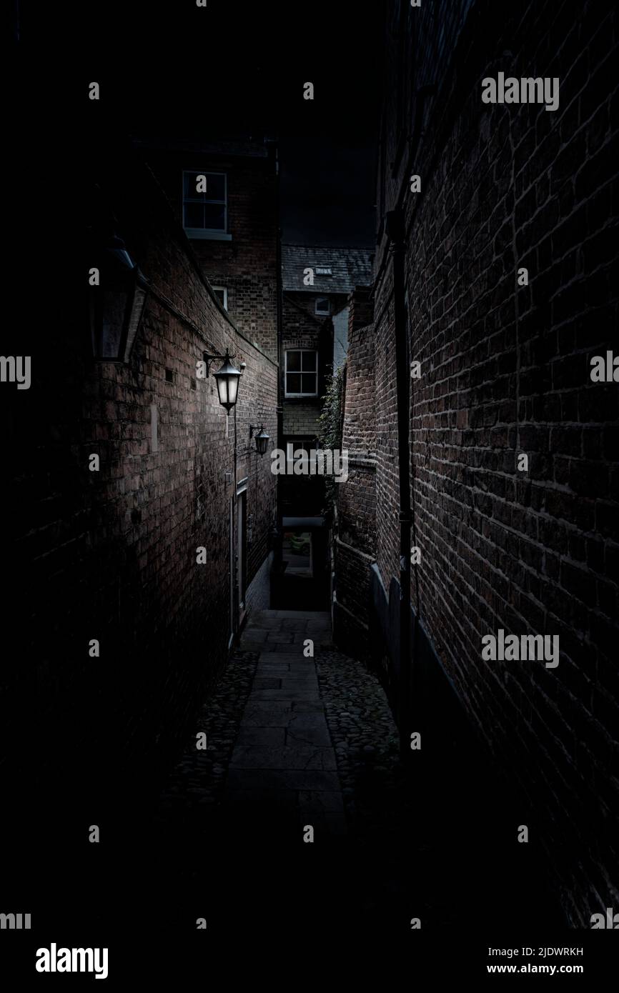 A dark urban back alley, Fear, anxiety, thriller, horror, haunting or ...