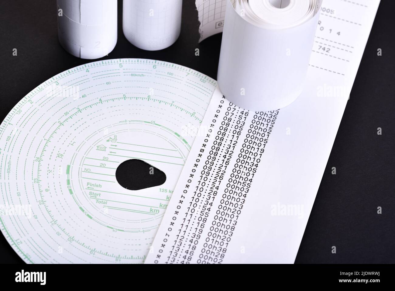 Digital and manual tachograph paper roll printed day shift Stock Photo ...
