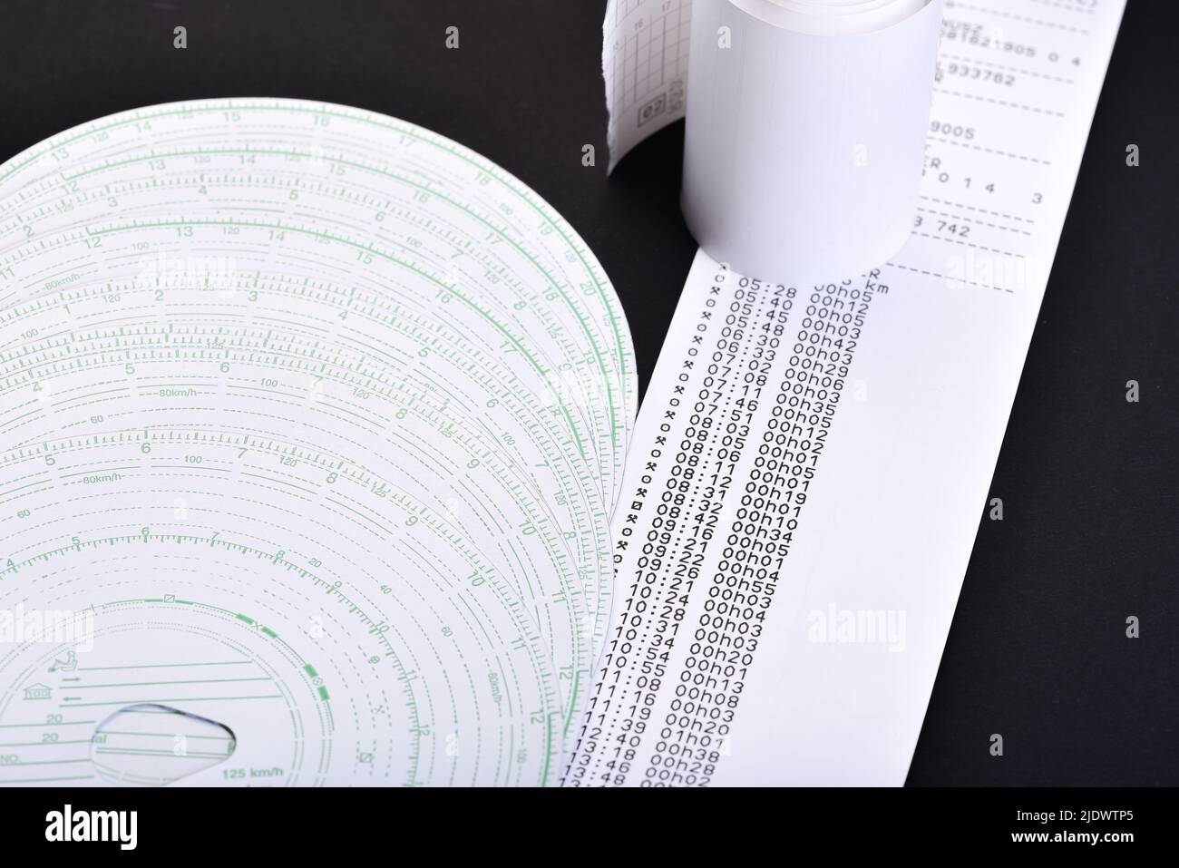 Digital and manual tachograph paper roll printed day shift Stock Photo ...