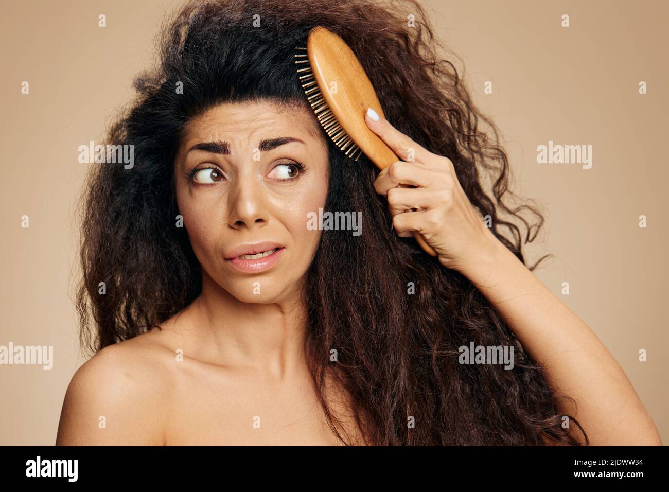 HAIR PROBLEMS. TANGLED HAIR CONCEPT. Shocked excited upset suffering ...