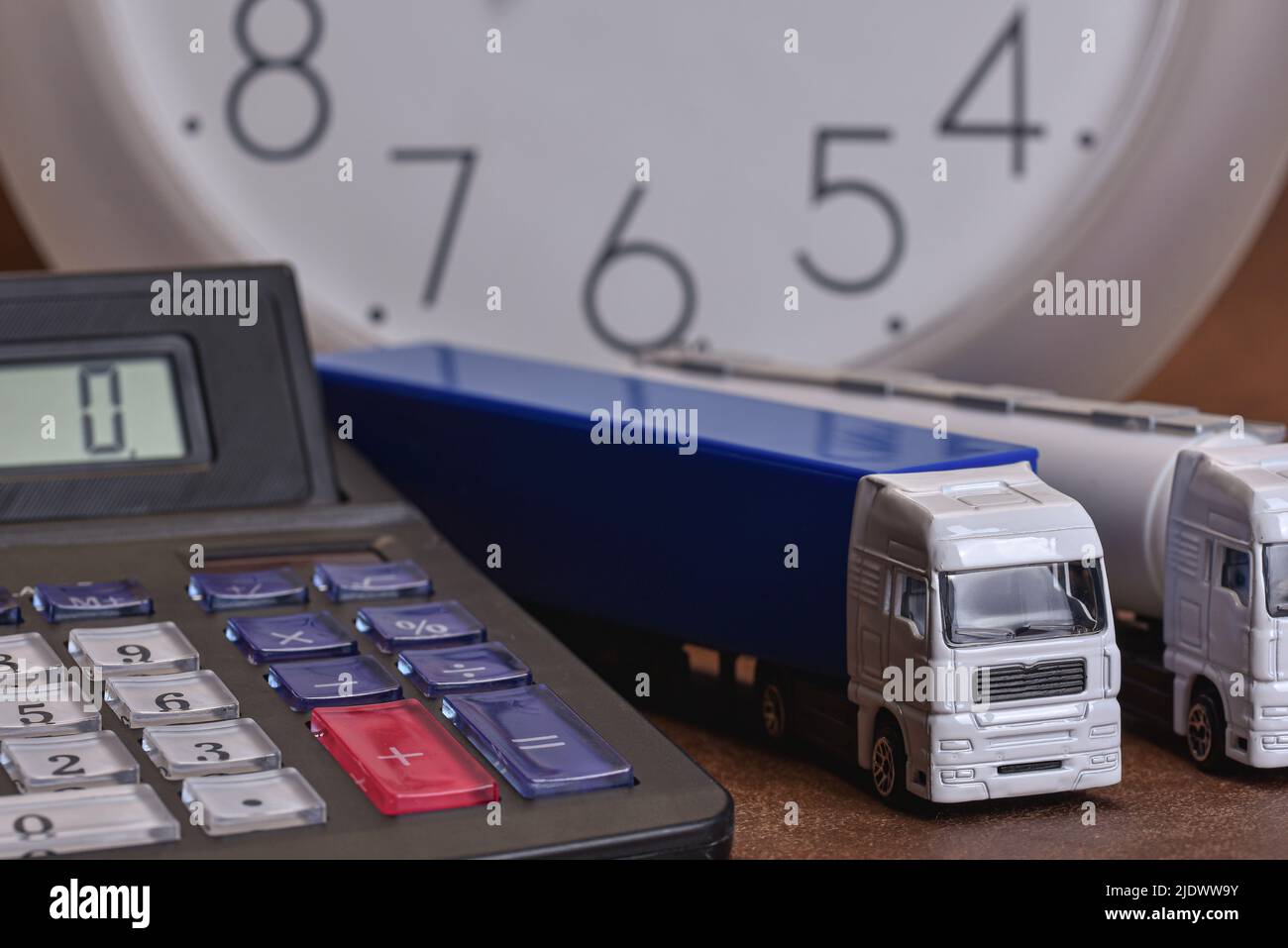 clock and lorry vehicle showing concept of important things like time ...