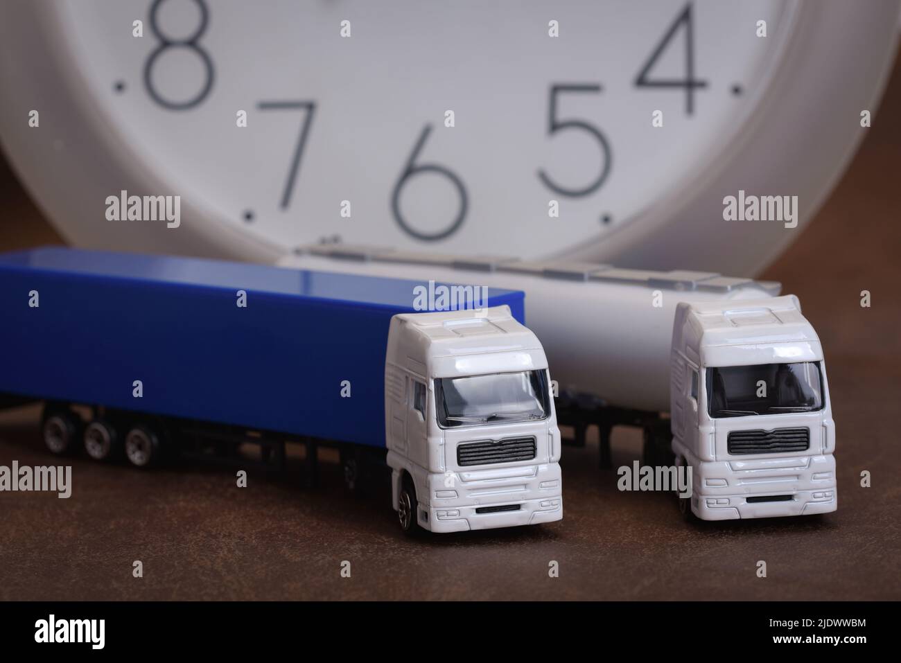 clock and lorry vehicle showing concept of important things like time ...