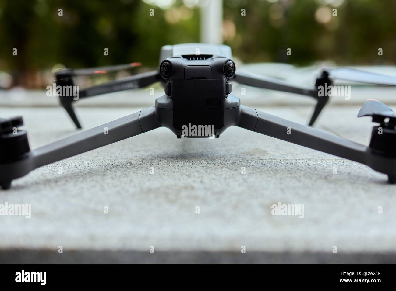 New drone a well - known company is standing on a concrete surface ...