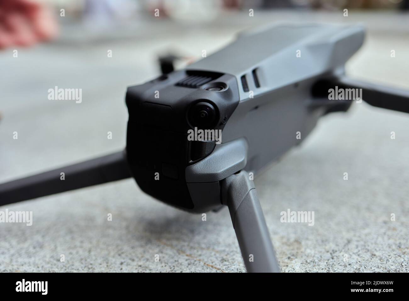 New drone a well - known company is standing on a concrete surface ...