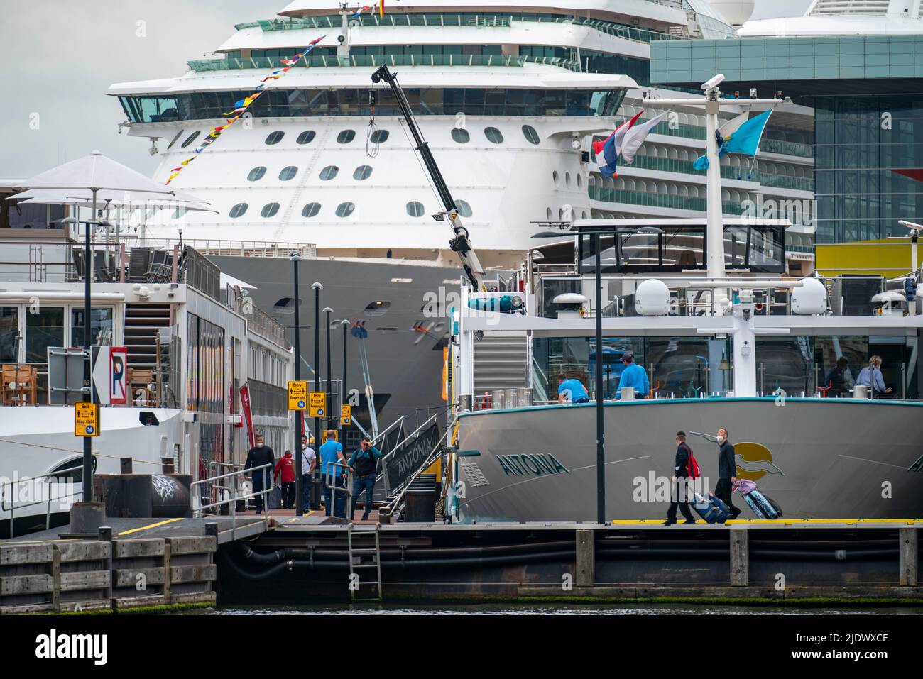 River cruise ships at the quay of the Ij, near the central station ...