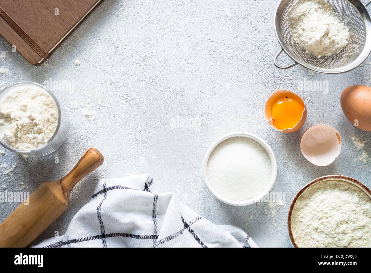 Baking background with cooking book and ingredients Stock Photo - Alamy