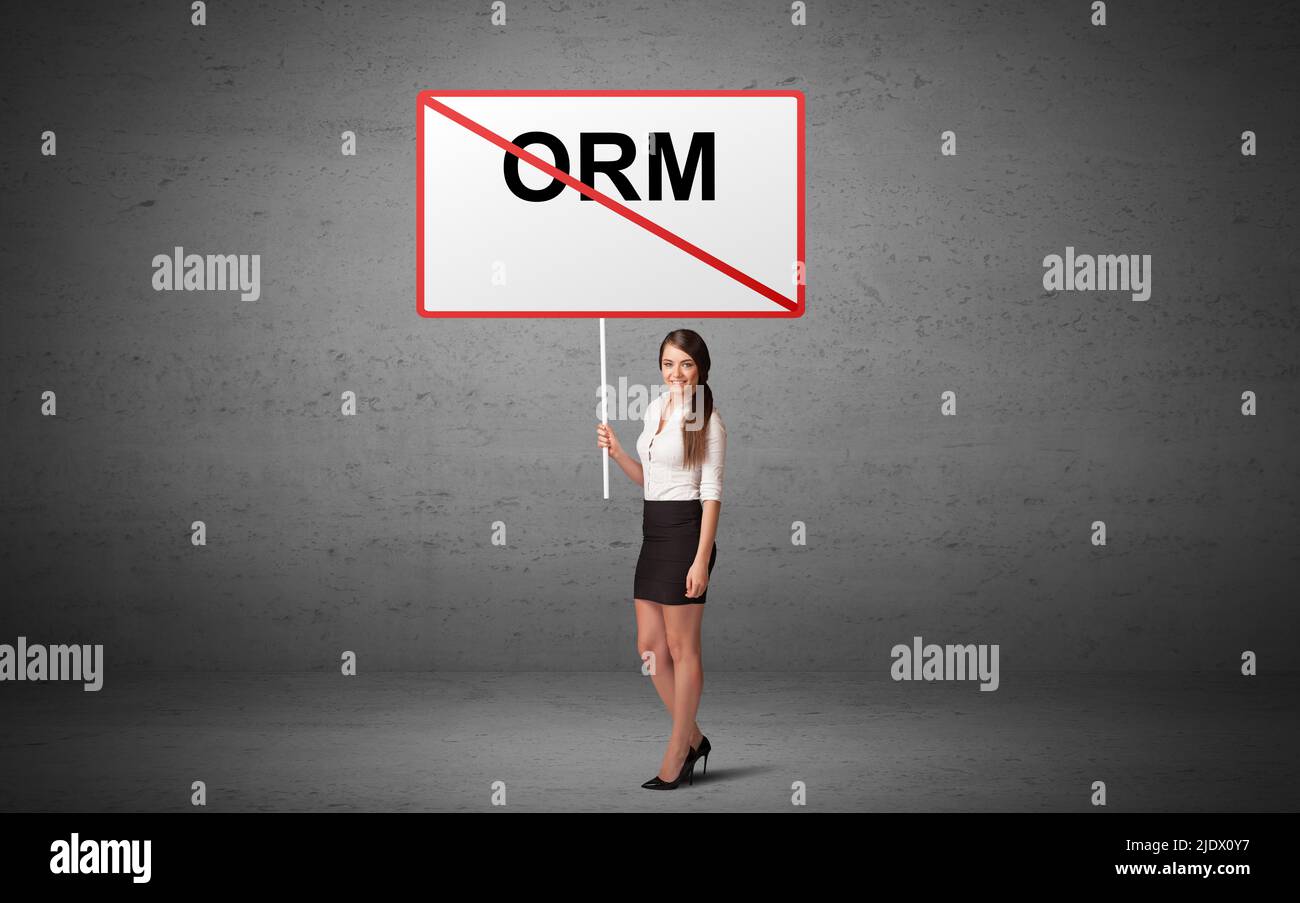 business person holding a traffic sign Stock Photo - Alamy