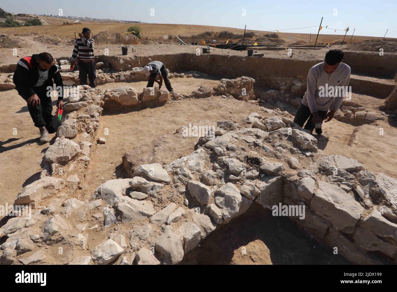 Rahat, Israel. 23rd June, 2022. People work around the relics of a ...