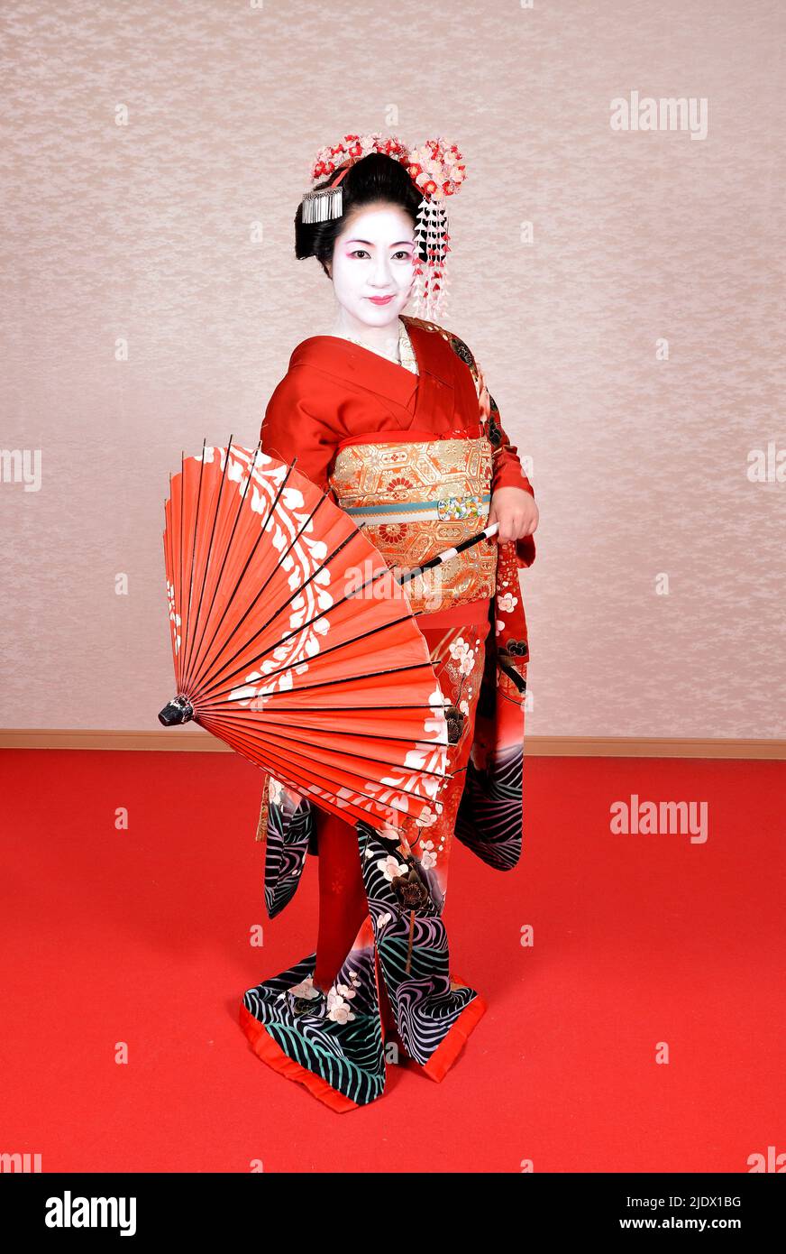 Lady dressed in Maiko (trainee Geisha) style kimono in Gion District ...