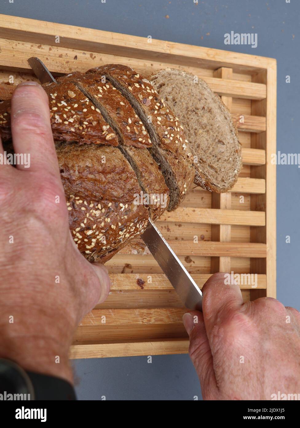 fresh loaf of bread cut into thick slices Stock Photo - Alamy