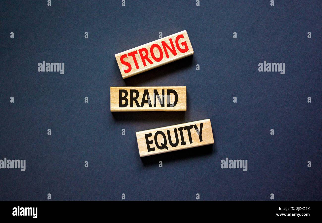 Strong brand equity symbol. Concept words Strong brand equity on wooden blocks on a beautiful ...