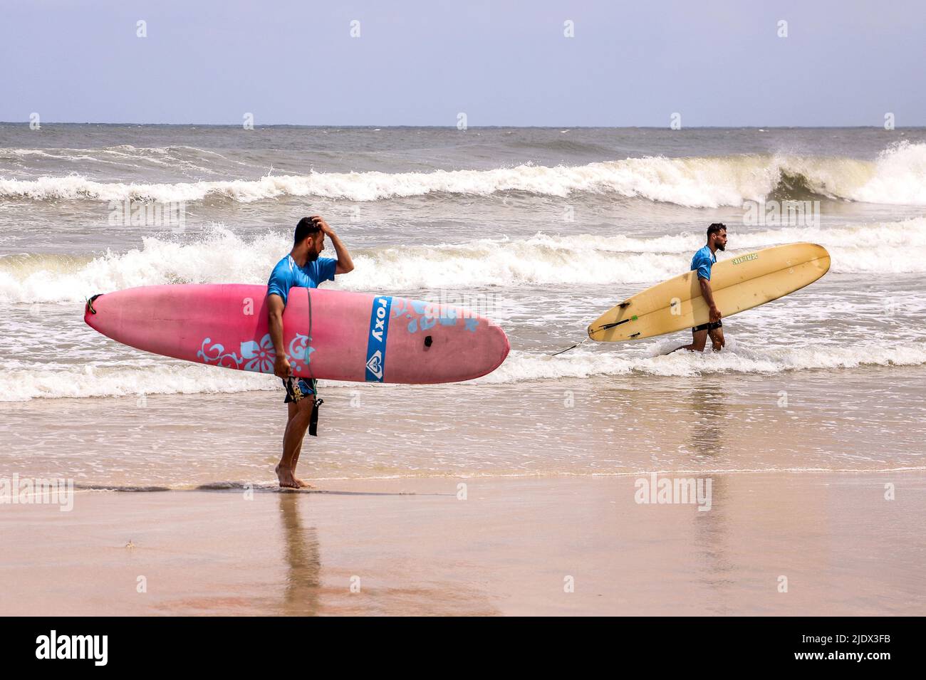 Palestinian athletes walk along the Mediterranean beach during the ...