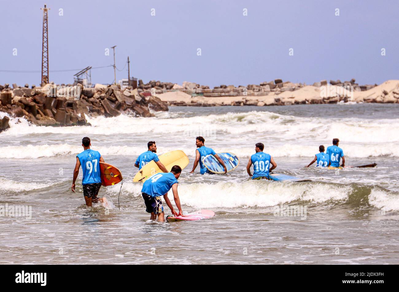 Palestinian athletes prepare during the surfing championship at the ...