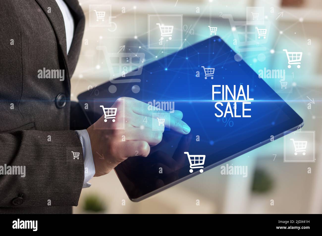 Young person makes a purchase through a tablet Stock Photo - Alamy