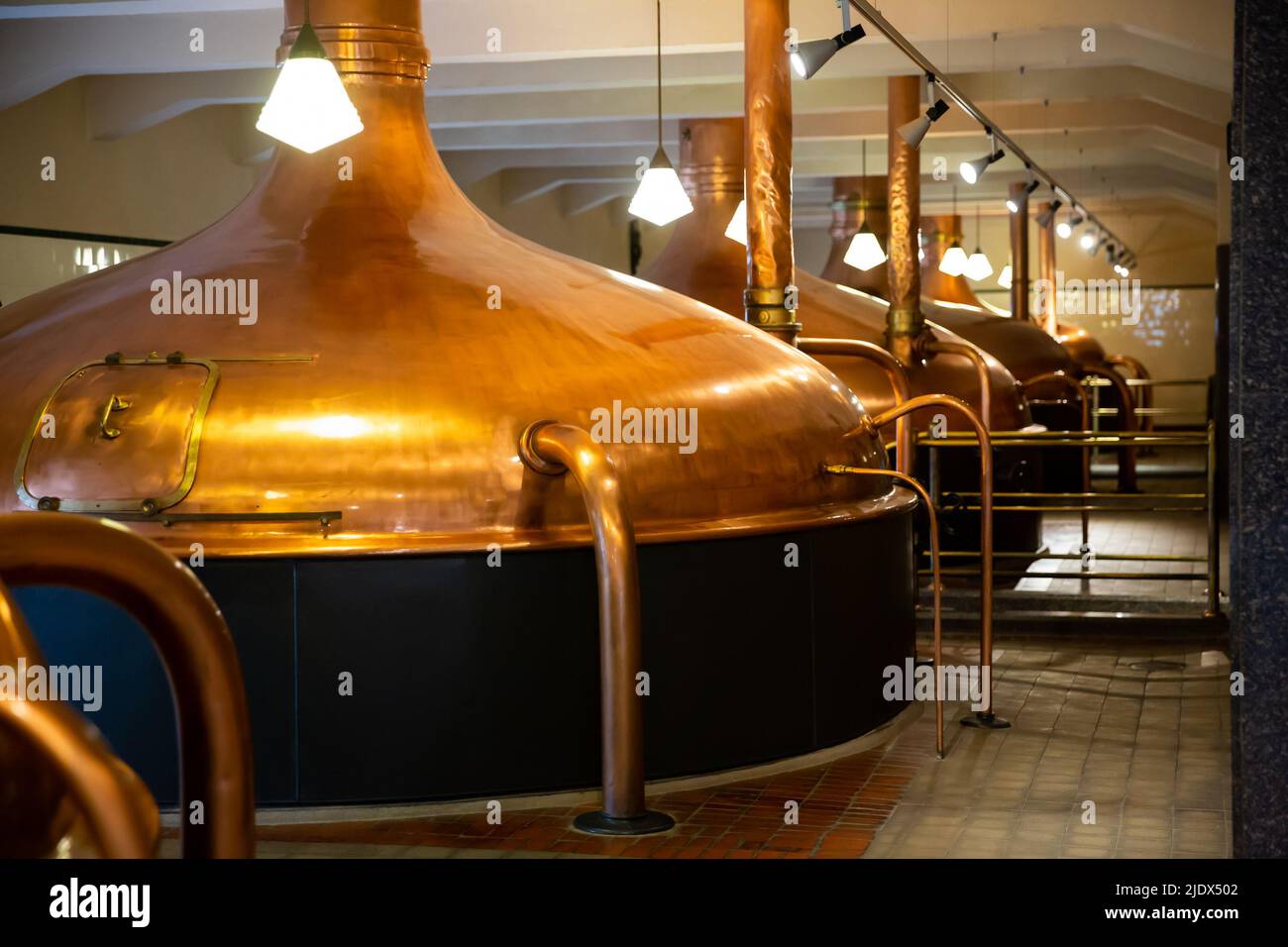 Copper beer tanks in brewhouse Stock Photo - Alamy
