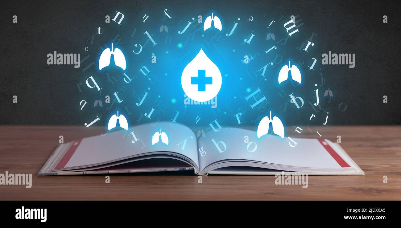 Open medical book with health icons above Stock Photo - Alamy