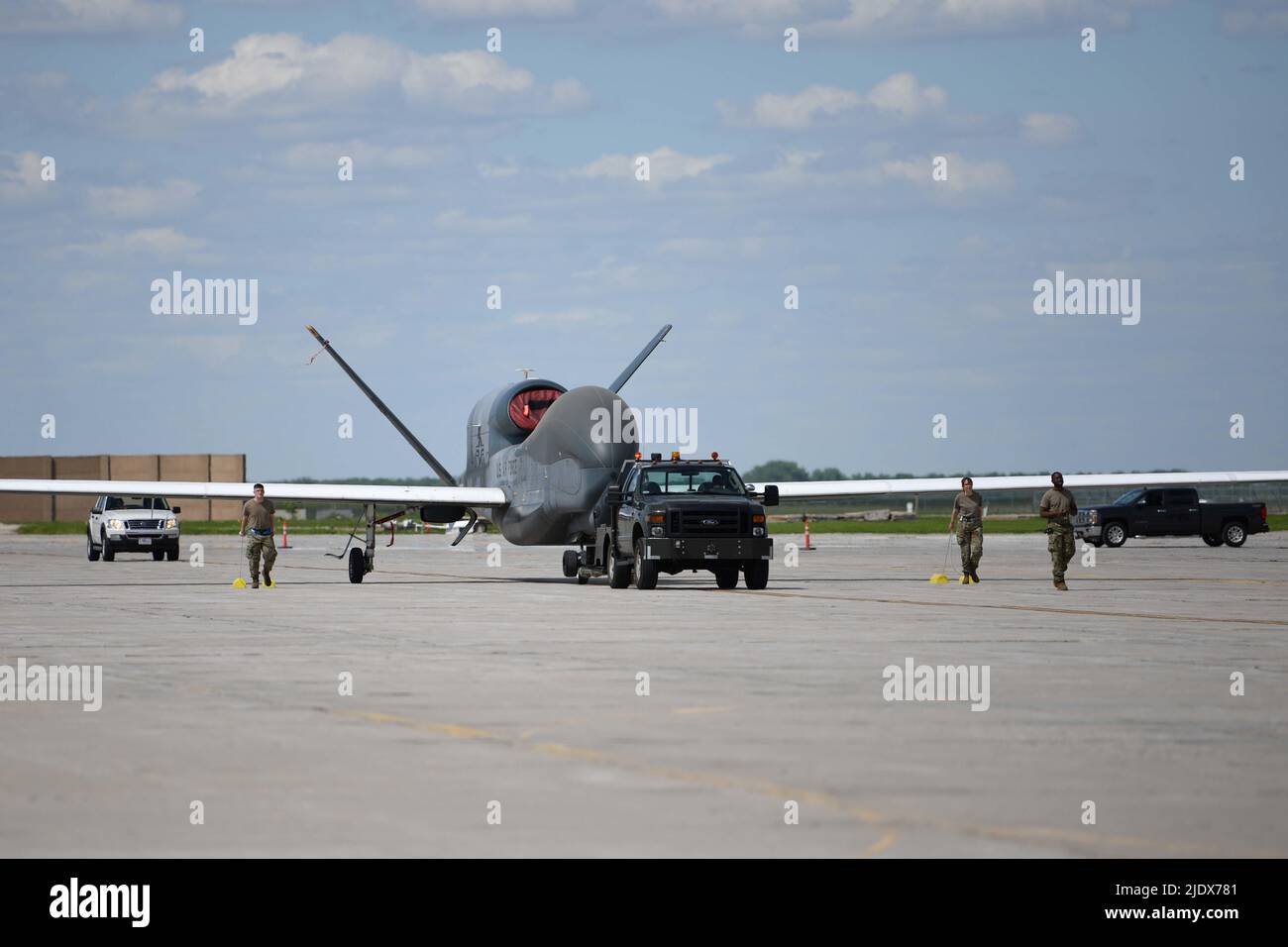 Airmen assigned to the 319th Aircraft Maintenance Squadron from Grand ...