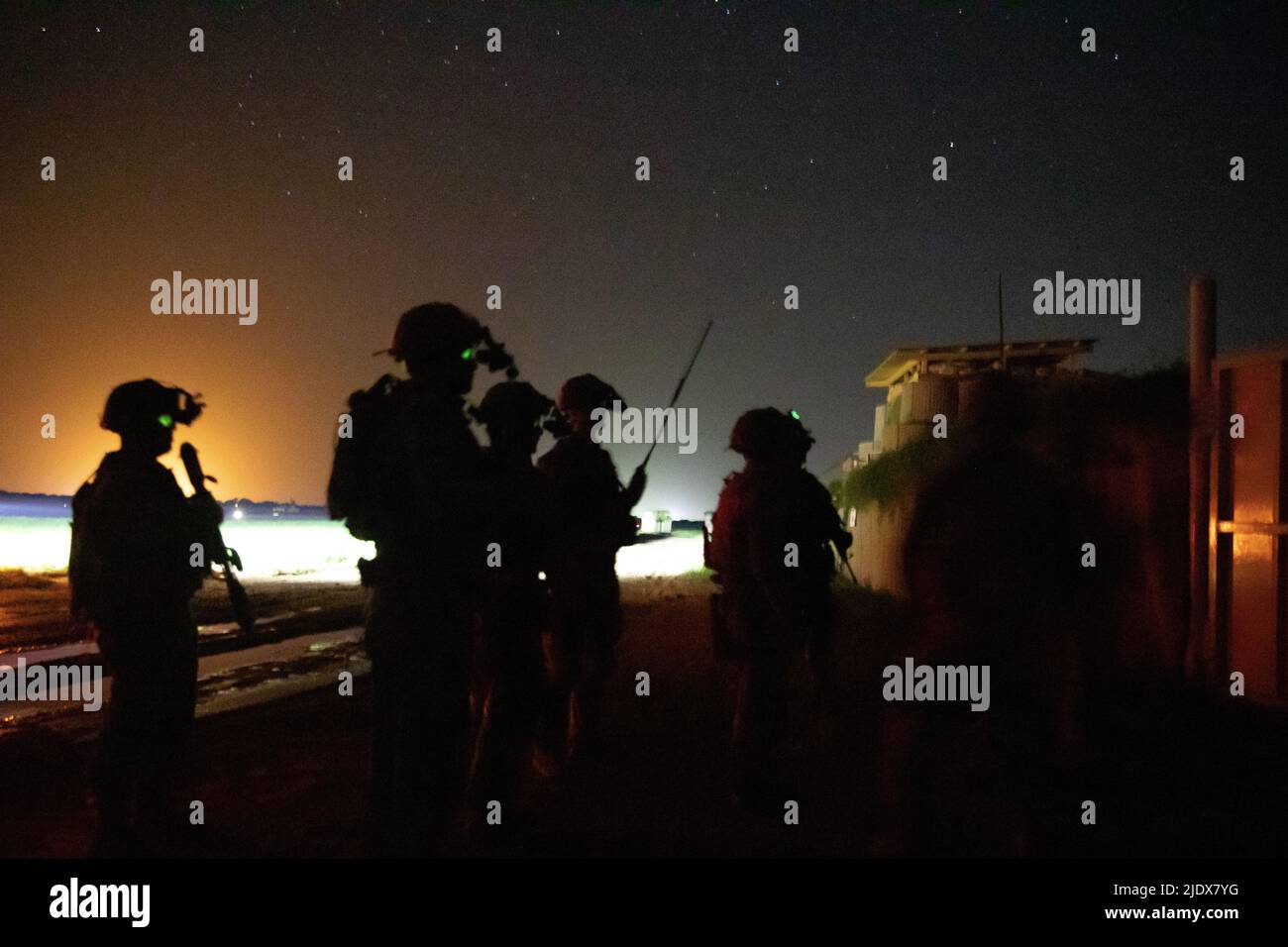 U.S. Army National Guard Soldiers assigned to Task Force Red Dragon, Combined Joint Task Force ...