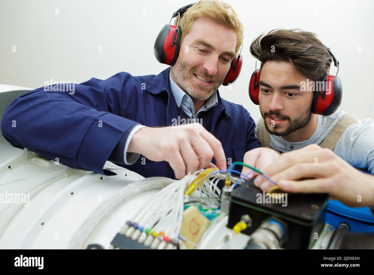 electrician engineer worker with cables Stock Photo - Alamy