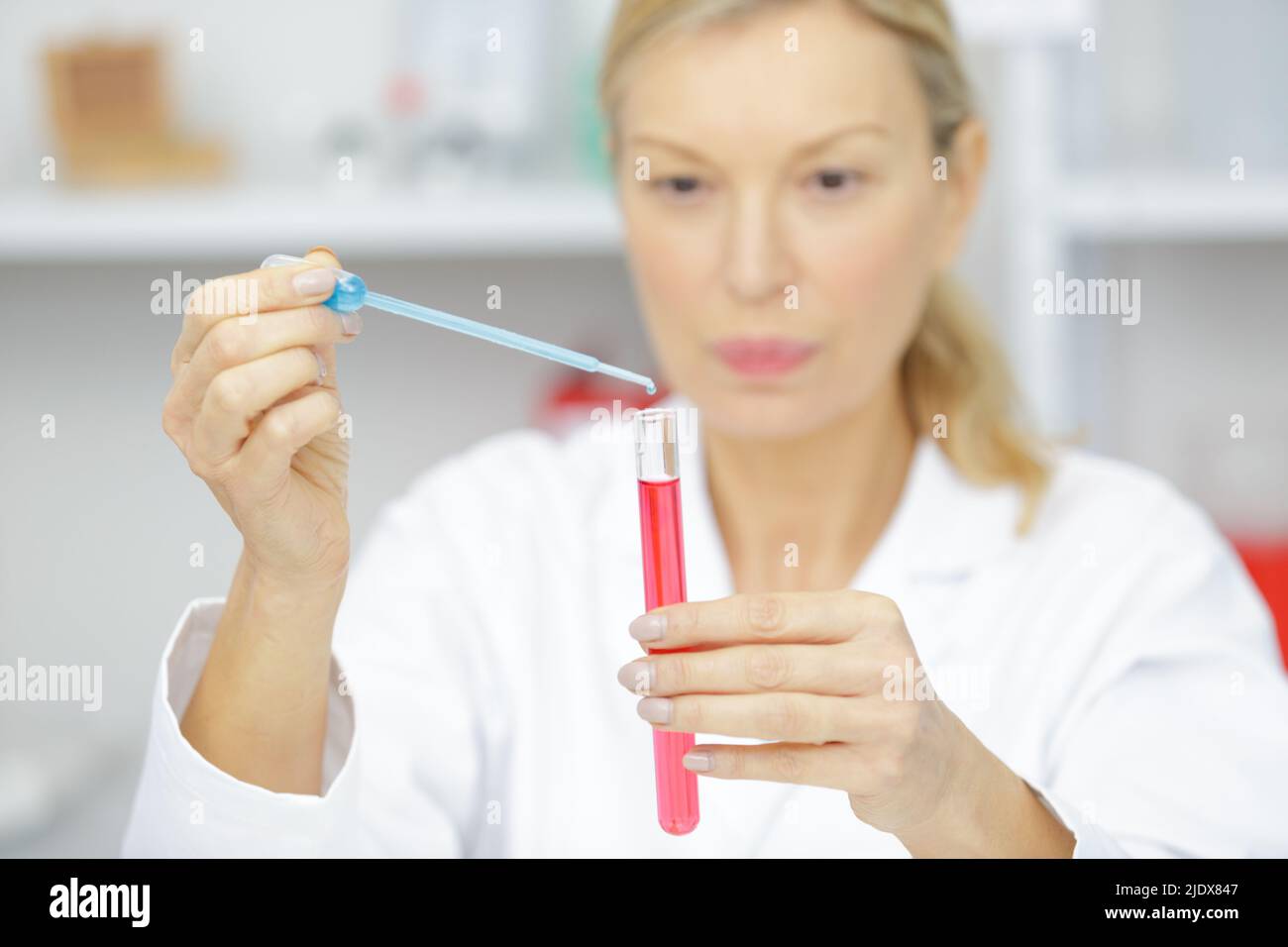 a mature woman lab worker Stock Photo - Alamy