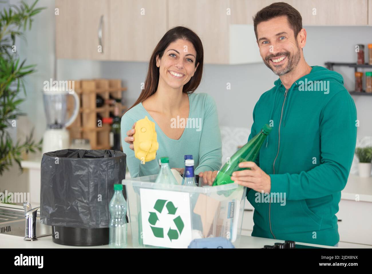 Married couple cleaning house hi-res stock photography and images - Alamy