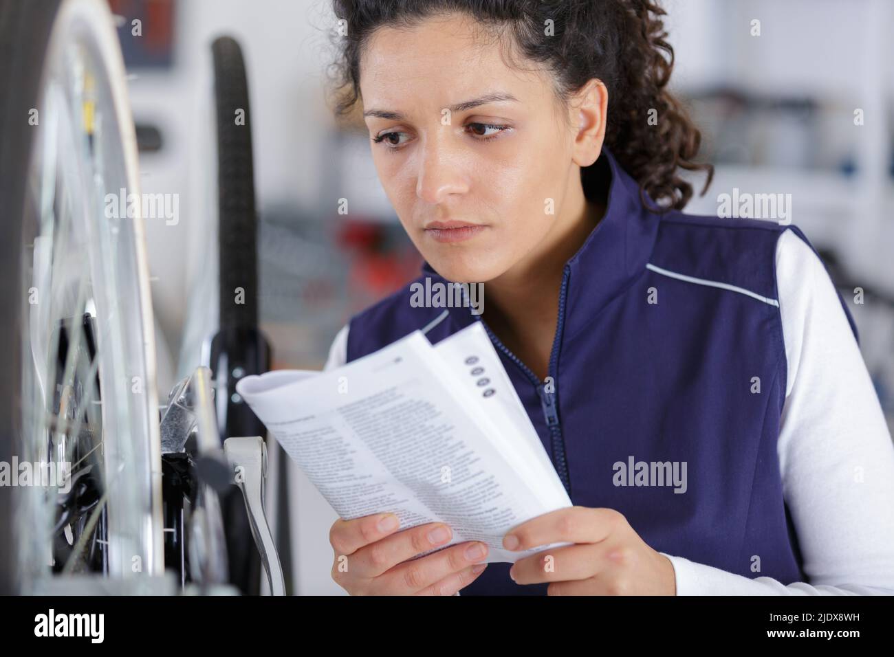Positive young female mechanic hi-res stock photography and images - Alamy