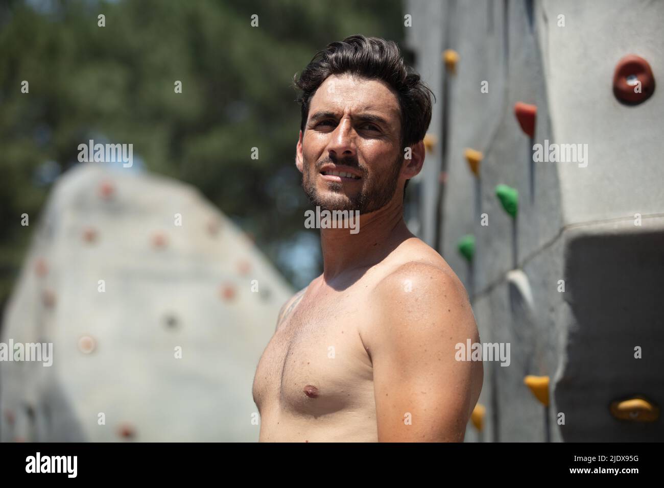 climber ready to conquer vertical wall with belay Stock Photo - Alamy