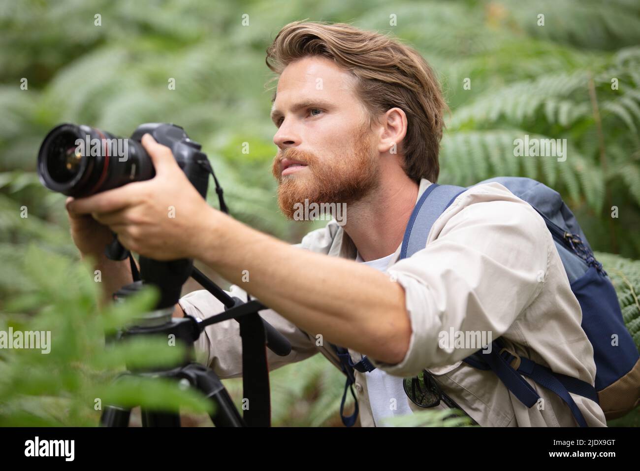 Young man takes photo beautiful hi-res stock photography and images - Alamy