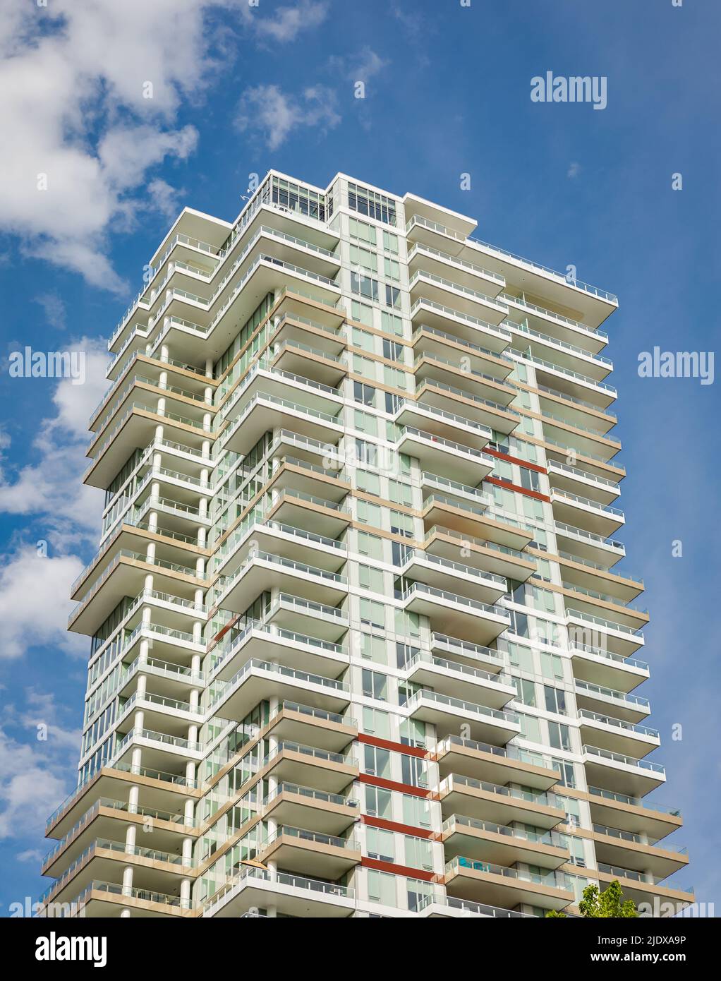 Detail of modern high-rise building. High rises in Kelowna downtown on ...