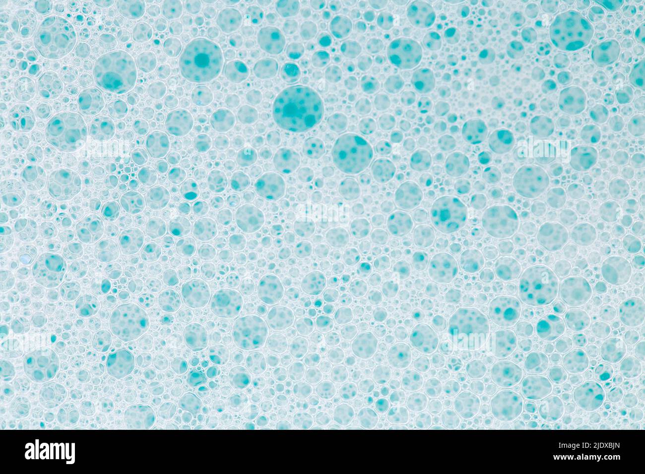 .Blue water with white foam bubbles.Cleanliness and hygiene background.foam bubbles. Foam Soap ...
