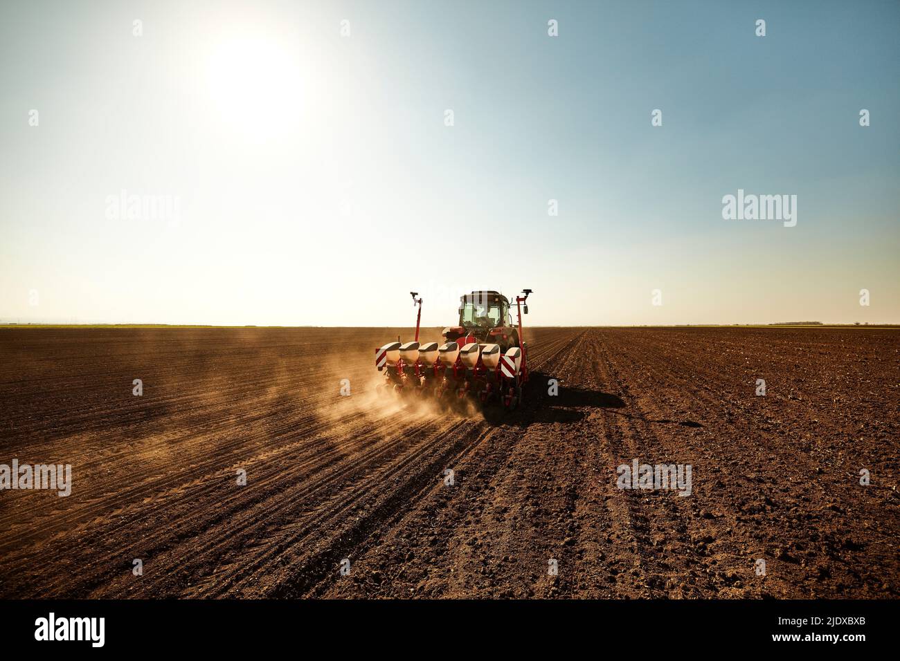 Tractor with seeder hi-res stock photography and images - Alamy