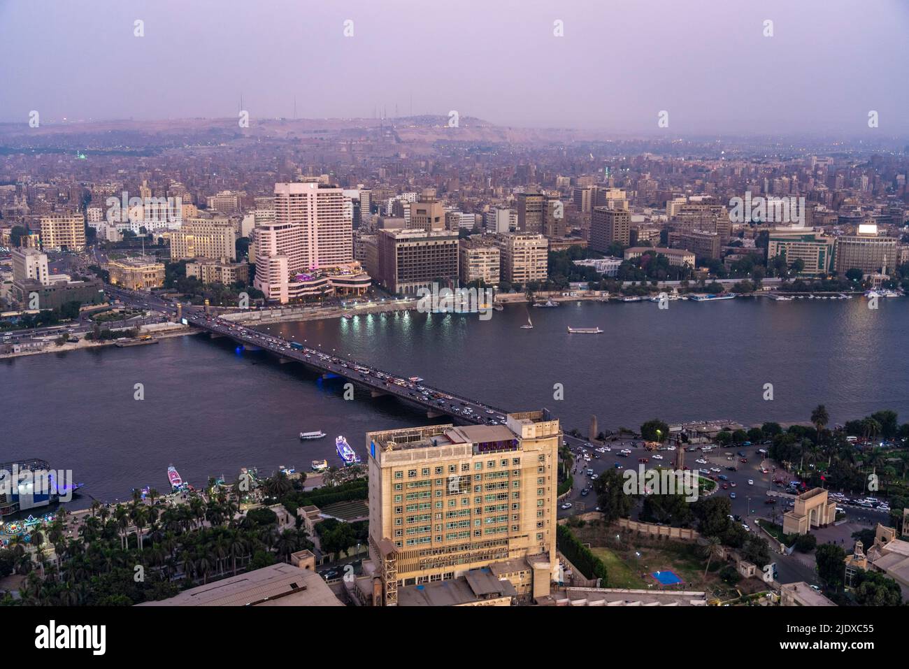 Egypt, Cairo, River Nile, Qasr El Nil Bridge and surrounding buildings ...