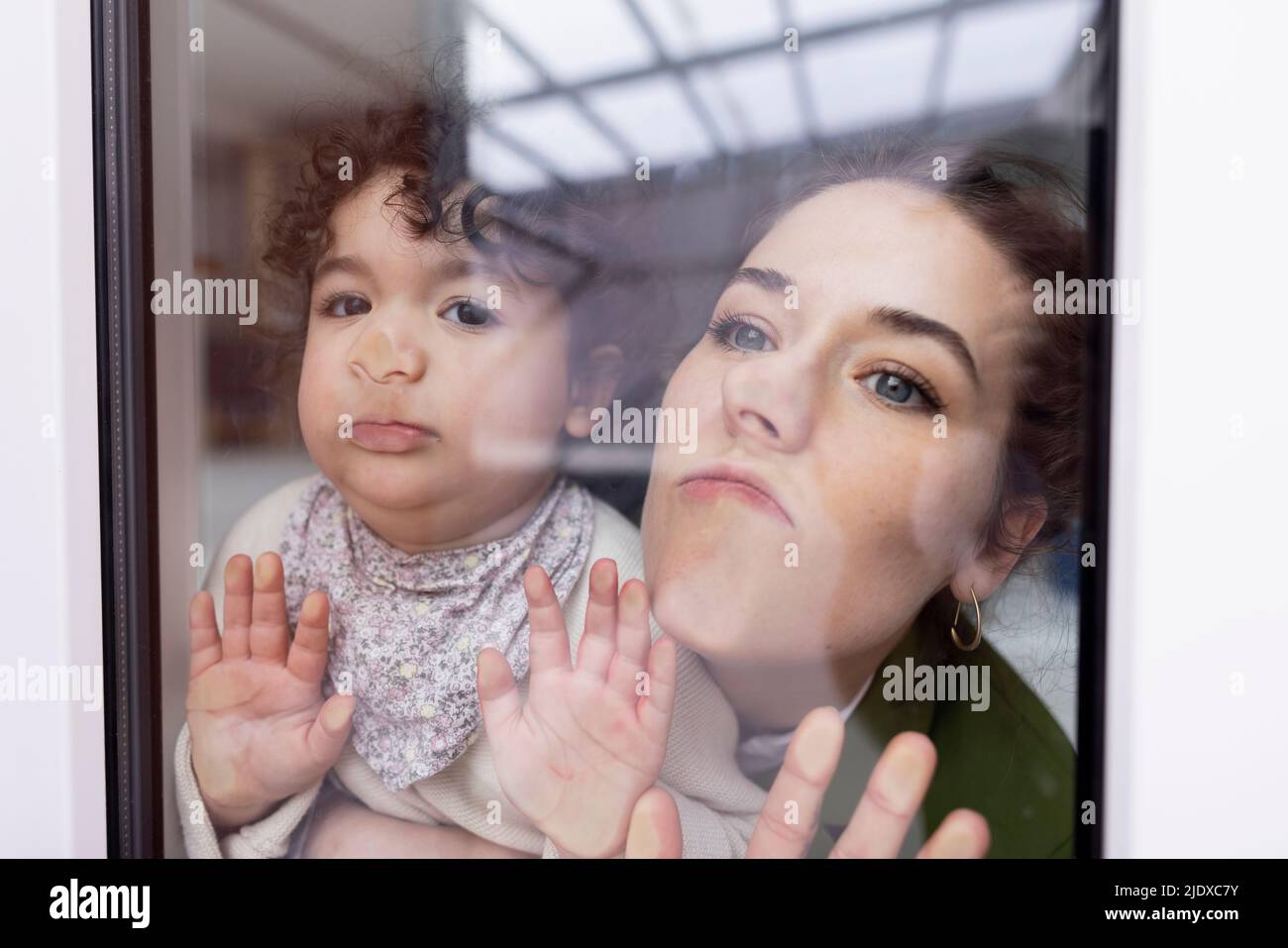 Woman pressing face hi-res stock photography and images - Alamy