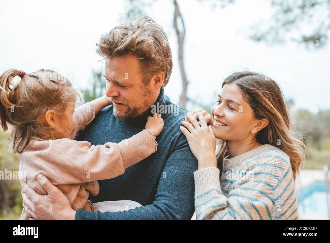 Parents watching children playing on hi-res stock photography and ...