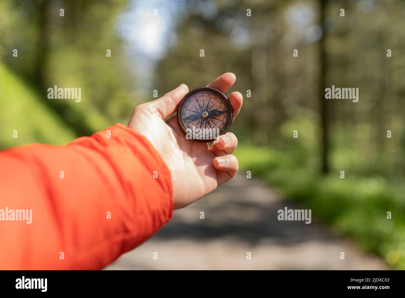 Man hand holding compass hi-res stock photography and images - Alamy