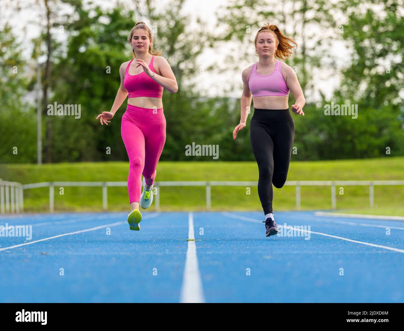 Running track on sports field hi-res stock photography and images - Alamy