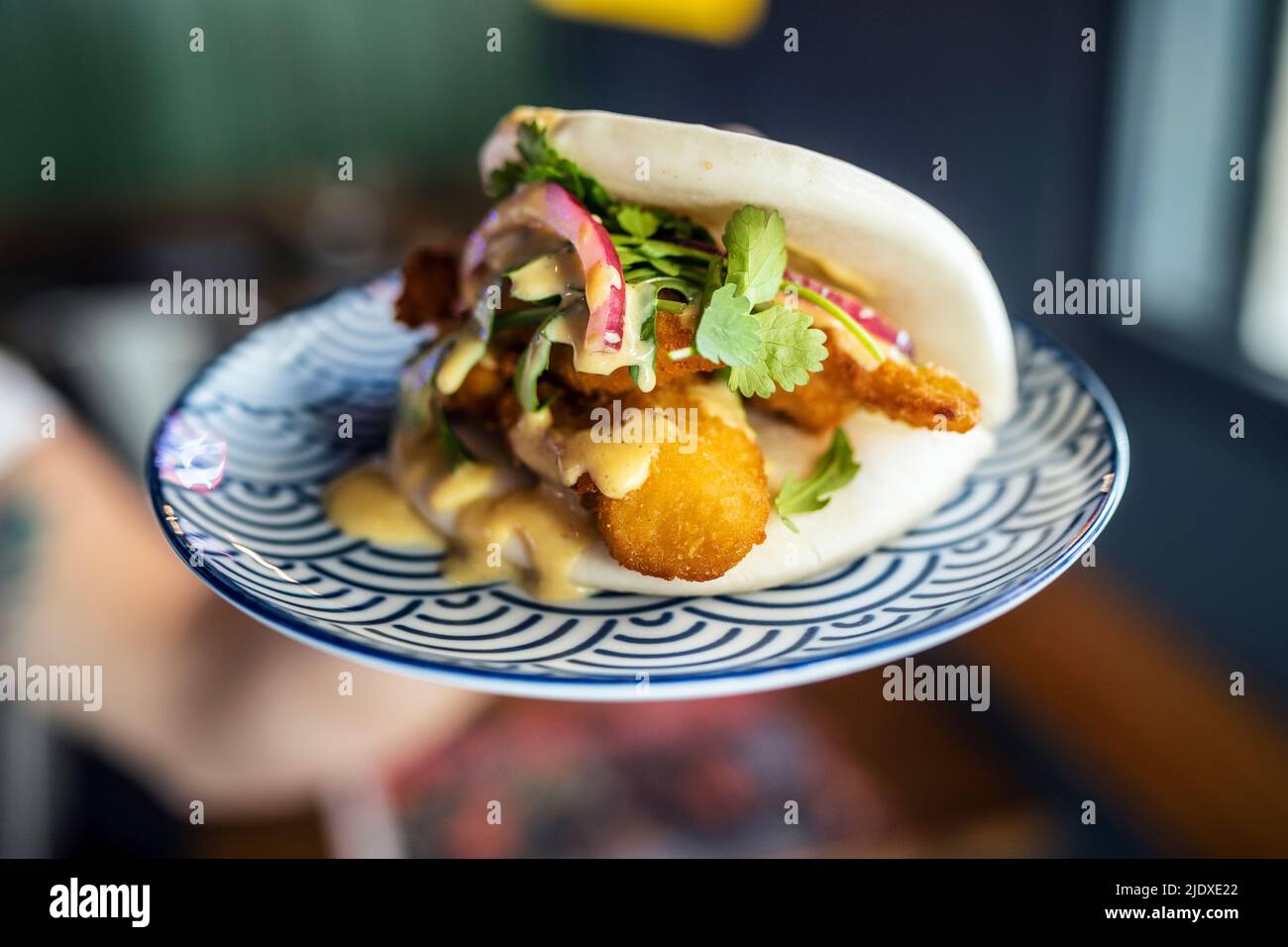 Freshly made food on plate at restaurant Stock Photo - Alamy