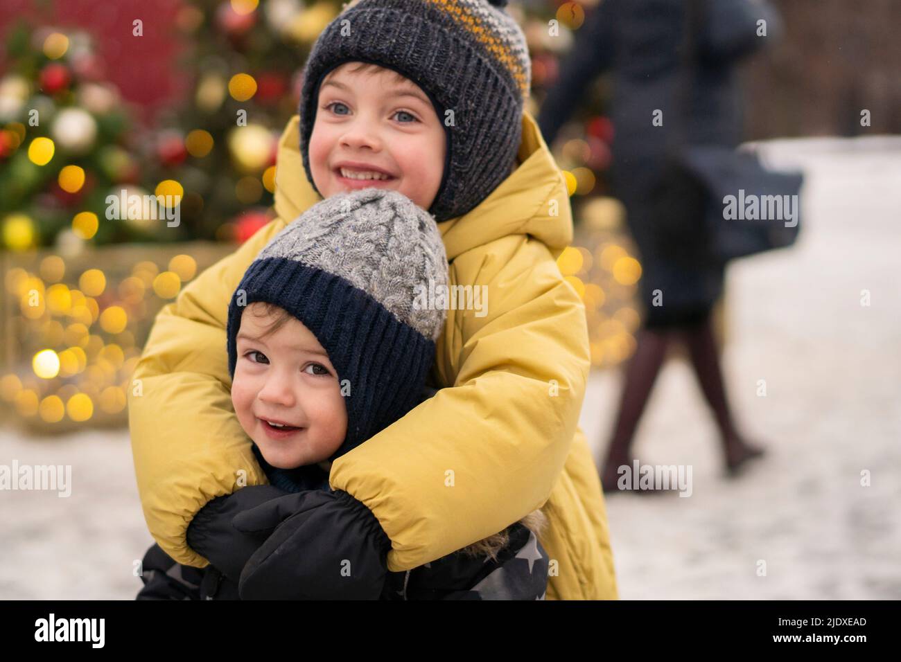 Brothers embracing on christmas day hi-res stock photography and images ...