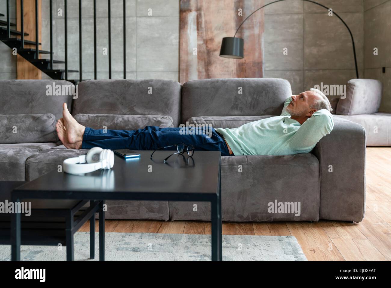 Man hands behind back side view hi-res stock photography and images - Alamy