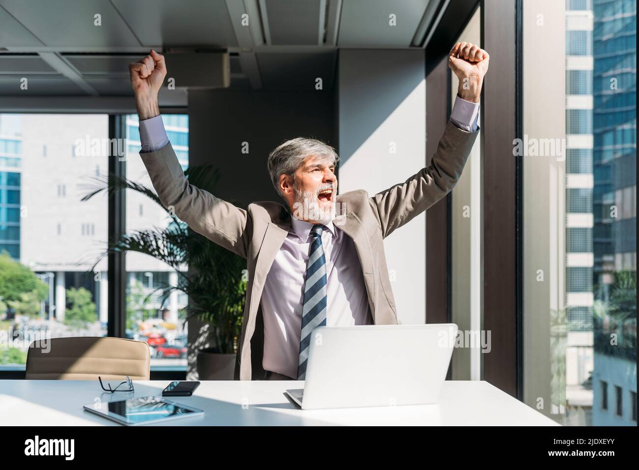 Success sitting hi-res stock photography and images - Alamy