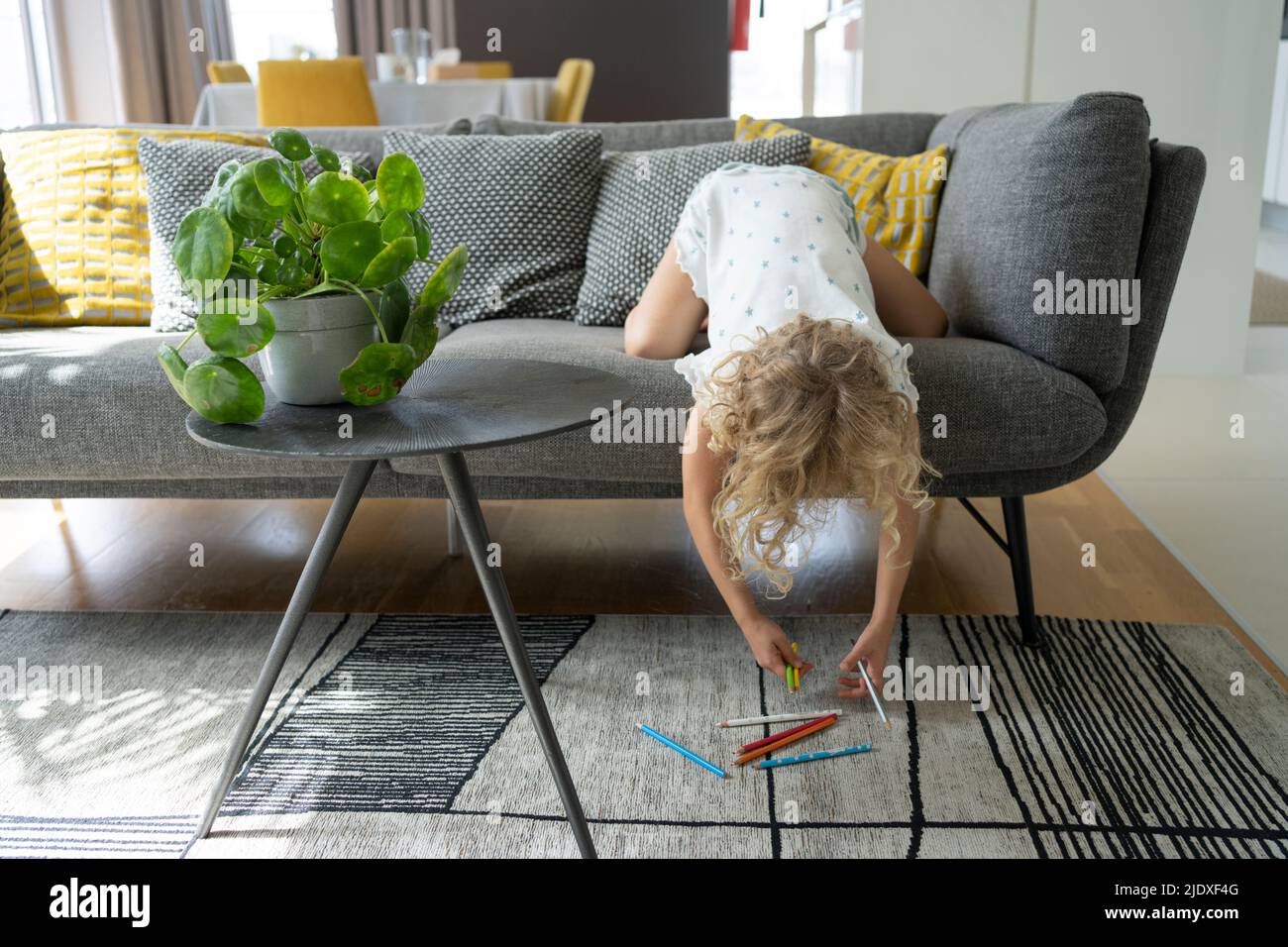 Girl pencils hi-res stock photography and images - Alamy